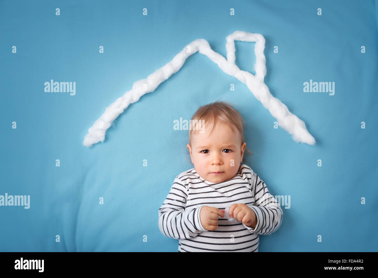 little boy with shape of house Stock Photo - Alamy