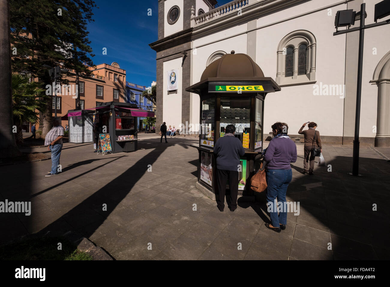 ONCE lottery seller in kiosk in the plaza next to the cathedral of La ...