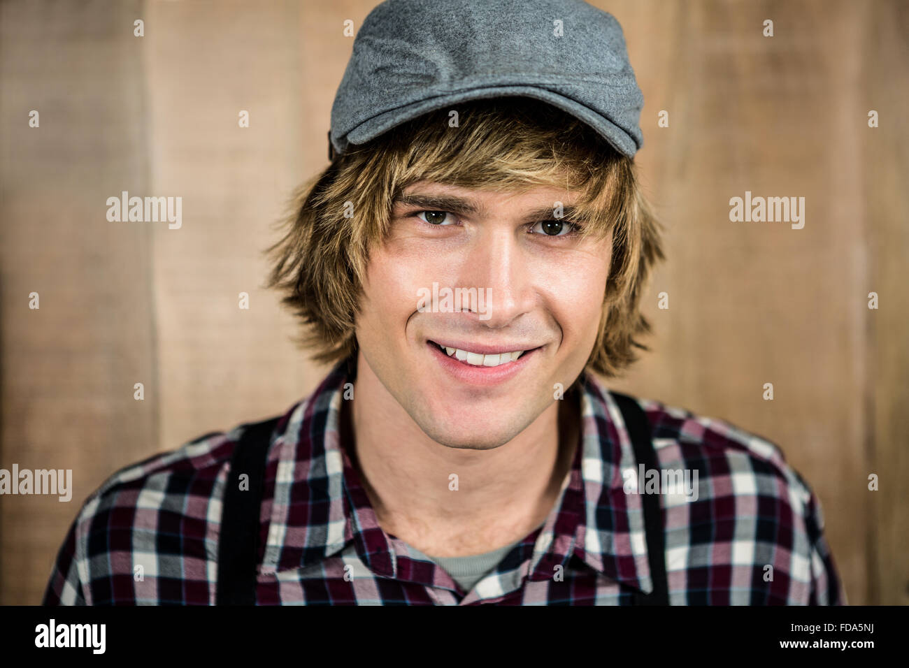 Smiling blond hipster staring at camera Stock Photo - Alamy