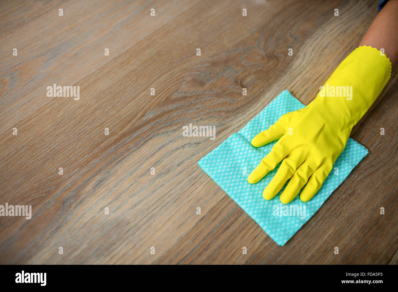 Woman cleaning up the table Stock Photo - Alamy