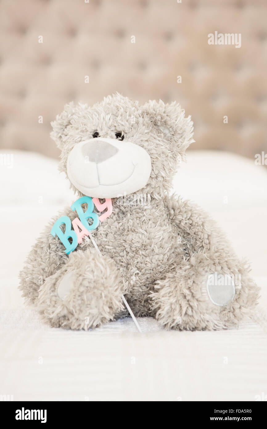 Teddy bear and baby Stock Photo - Alamy