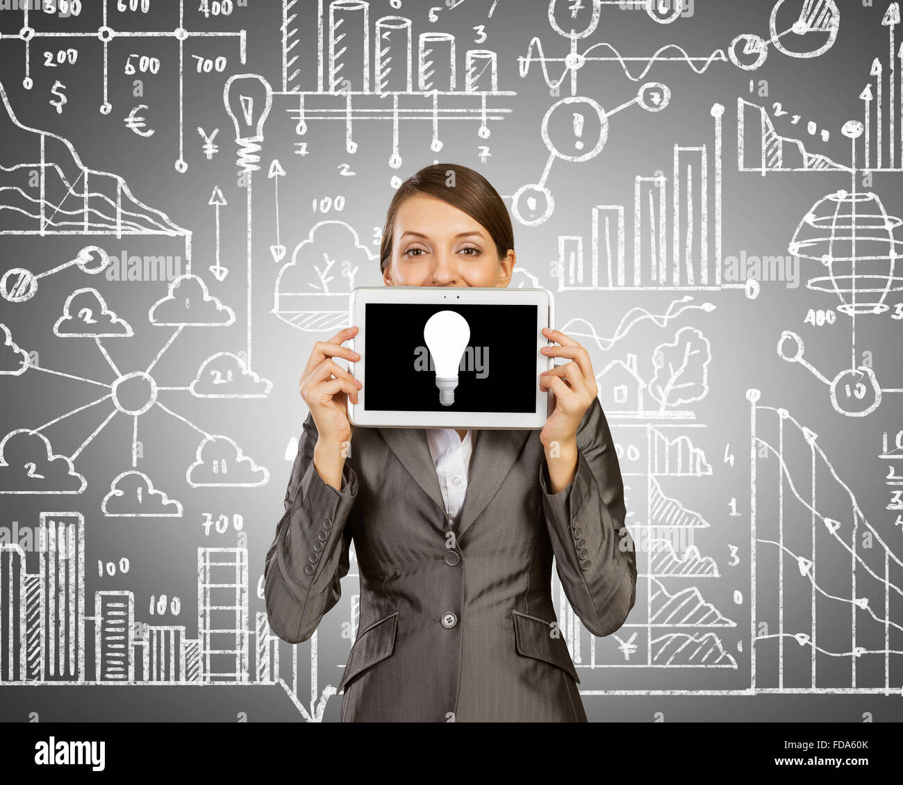 Woman sharing her idea using tablet computer Stock Photo - Alamy