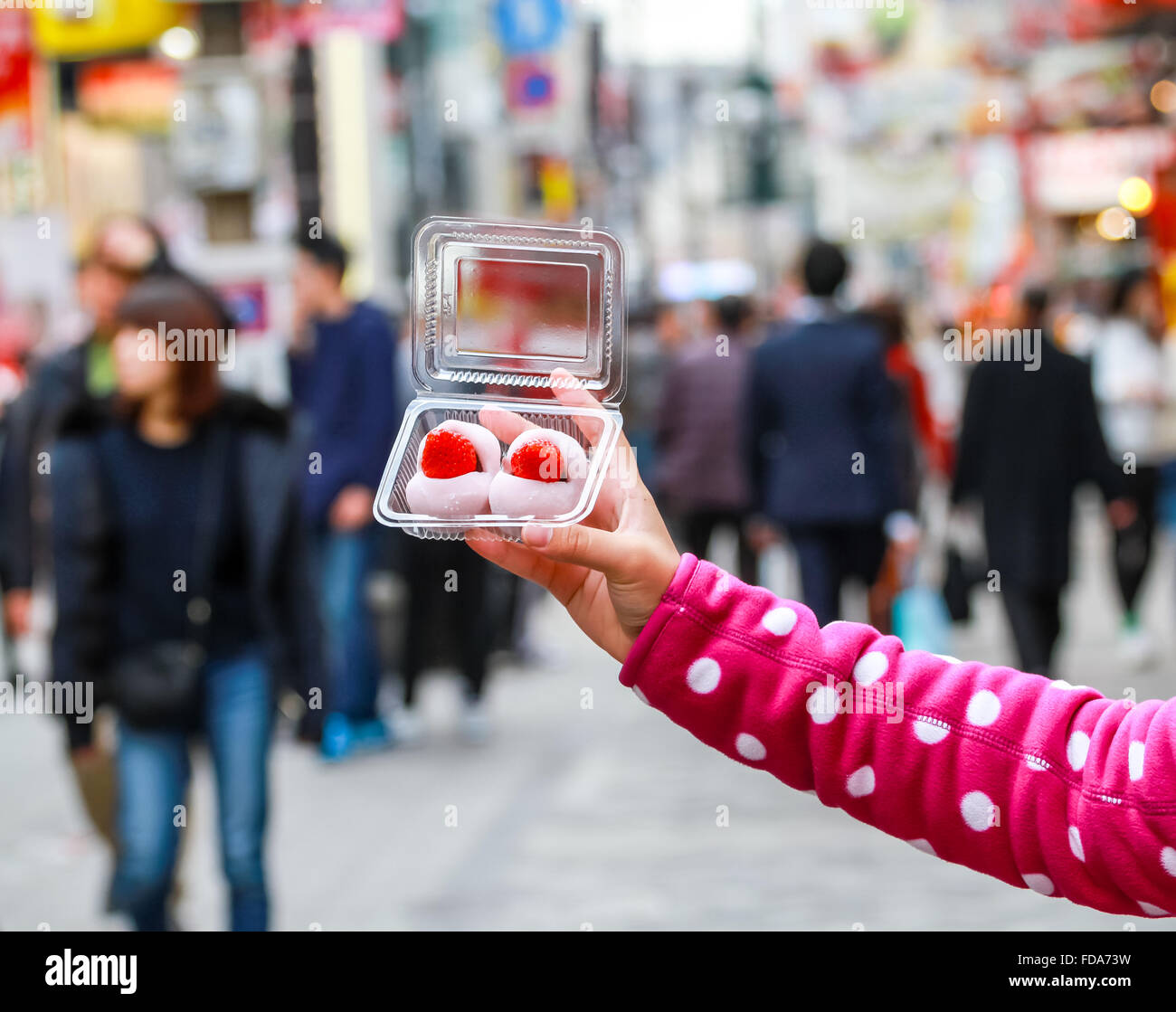 Caucasian hand holding candy hi-res stock photography and images - Alamy