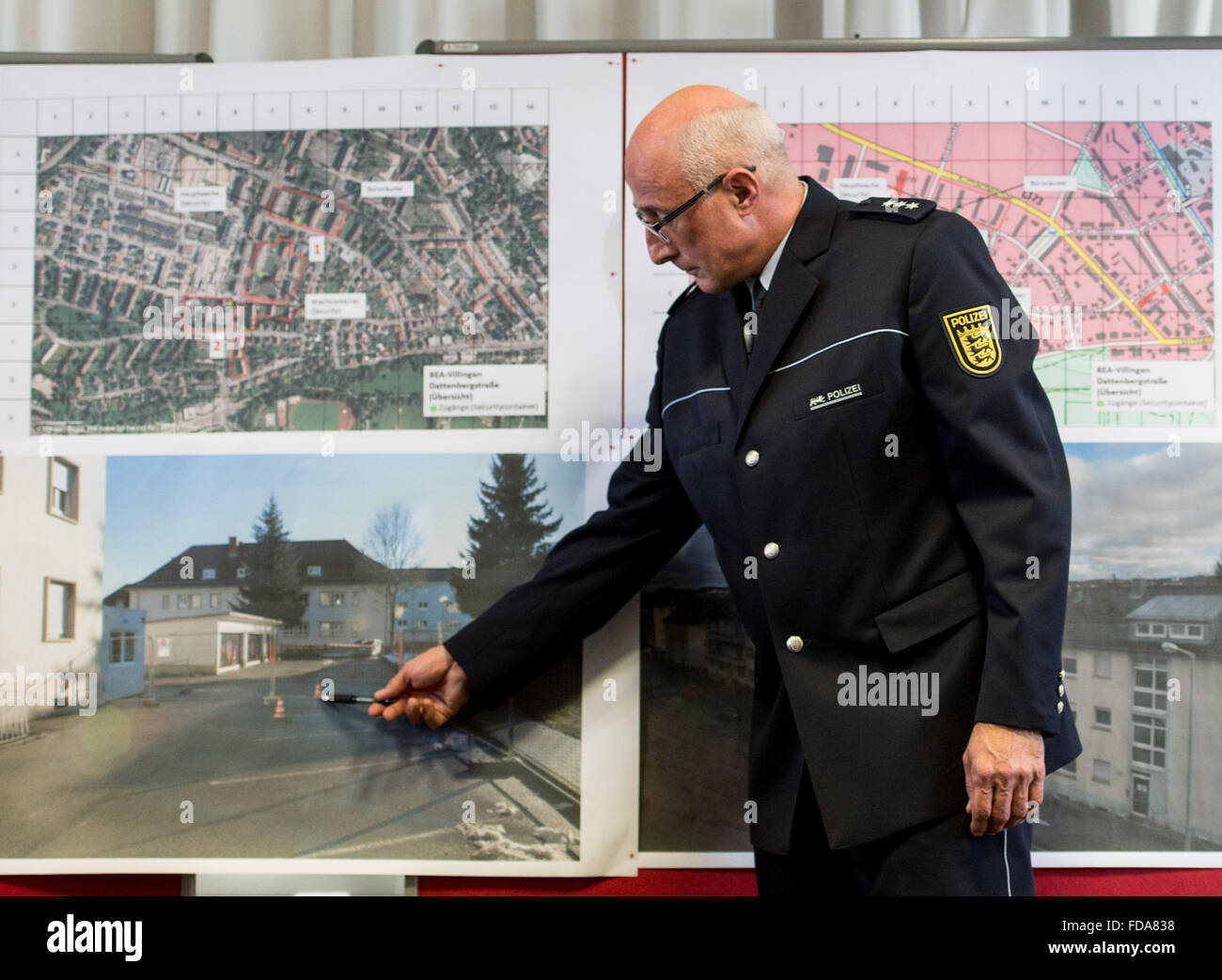Police spokesperson Thomas Sebold shows a picture of the offender who ...