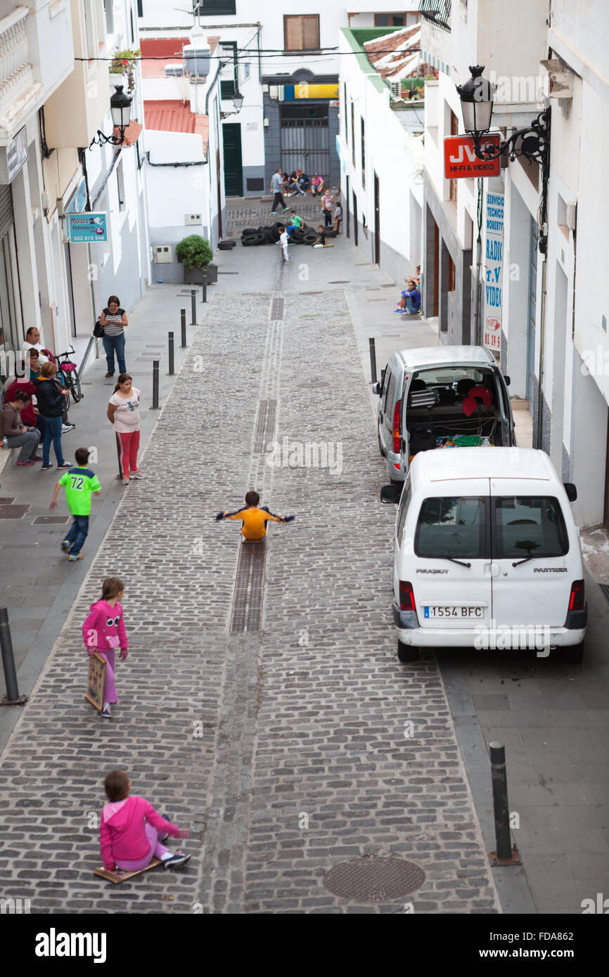 Children playing in the street. Icod de los Vinos, Spain Stock Photo ...