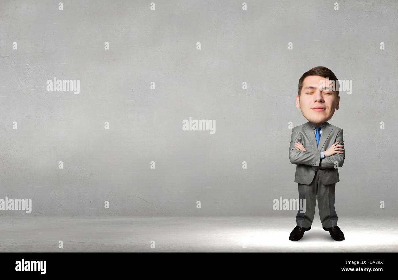 Young man with big head thinking about something Stock Photo - Alamy