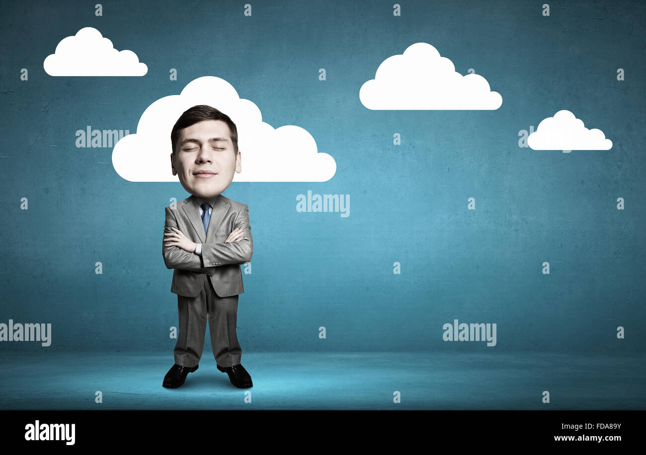 Young man with big head thinking about something Stock Photo - Alamy