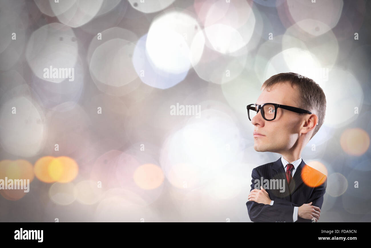 Young funny man in glasses with big head Stock Photo - Alamy