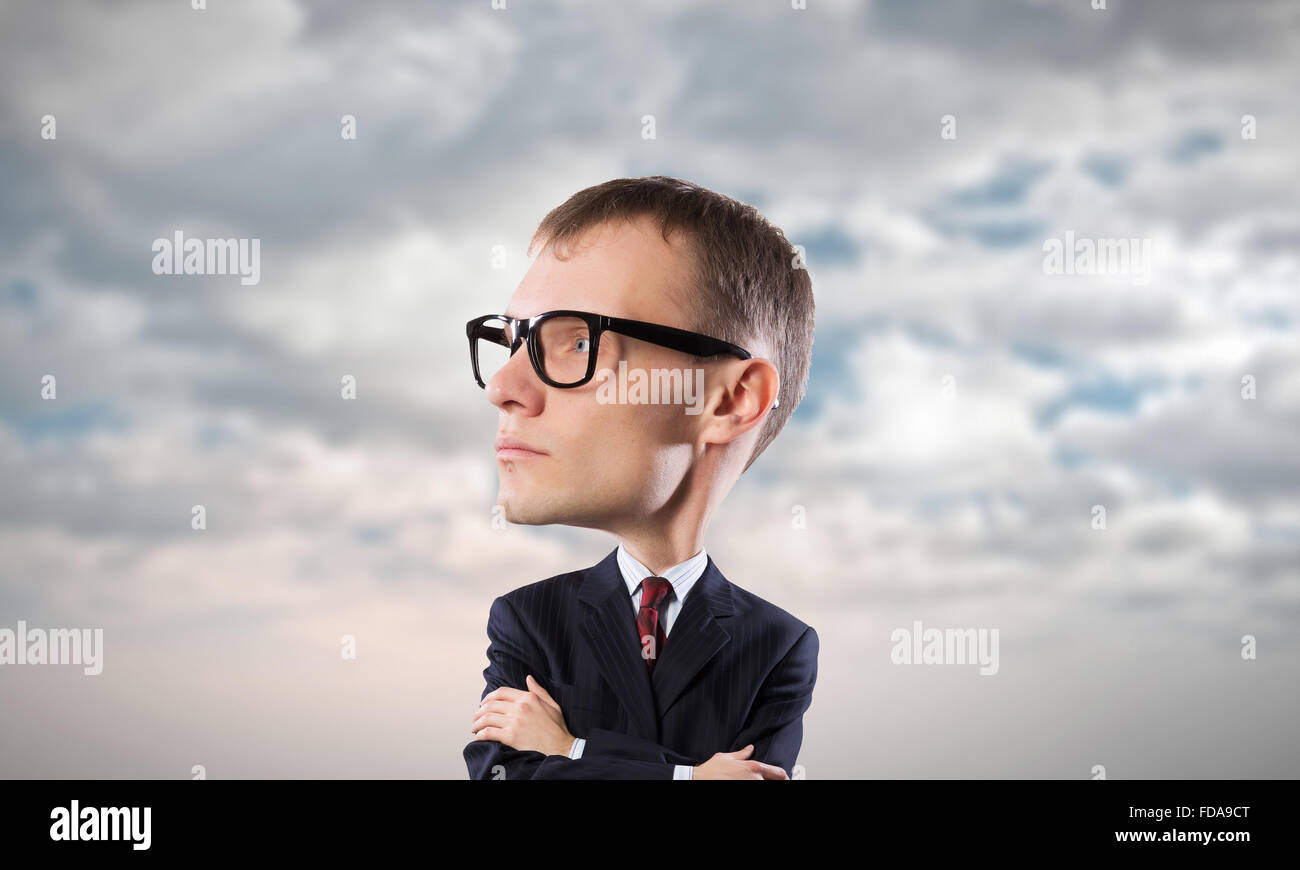 Young funny man in glasses with big head Stock Photo - Alamy