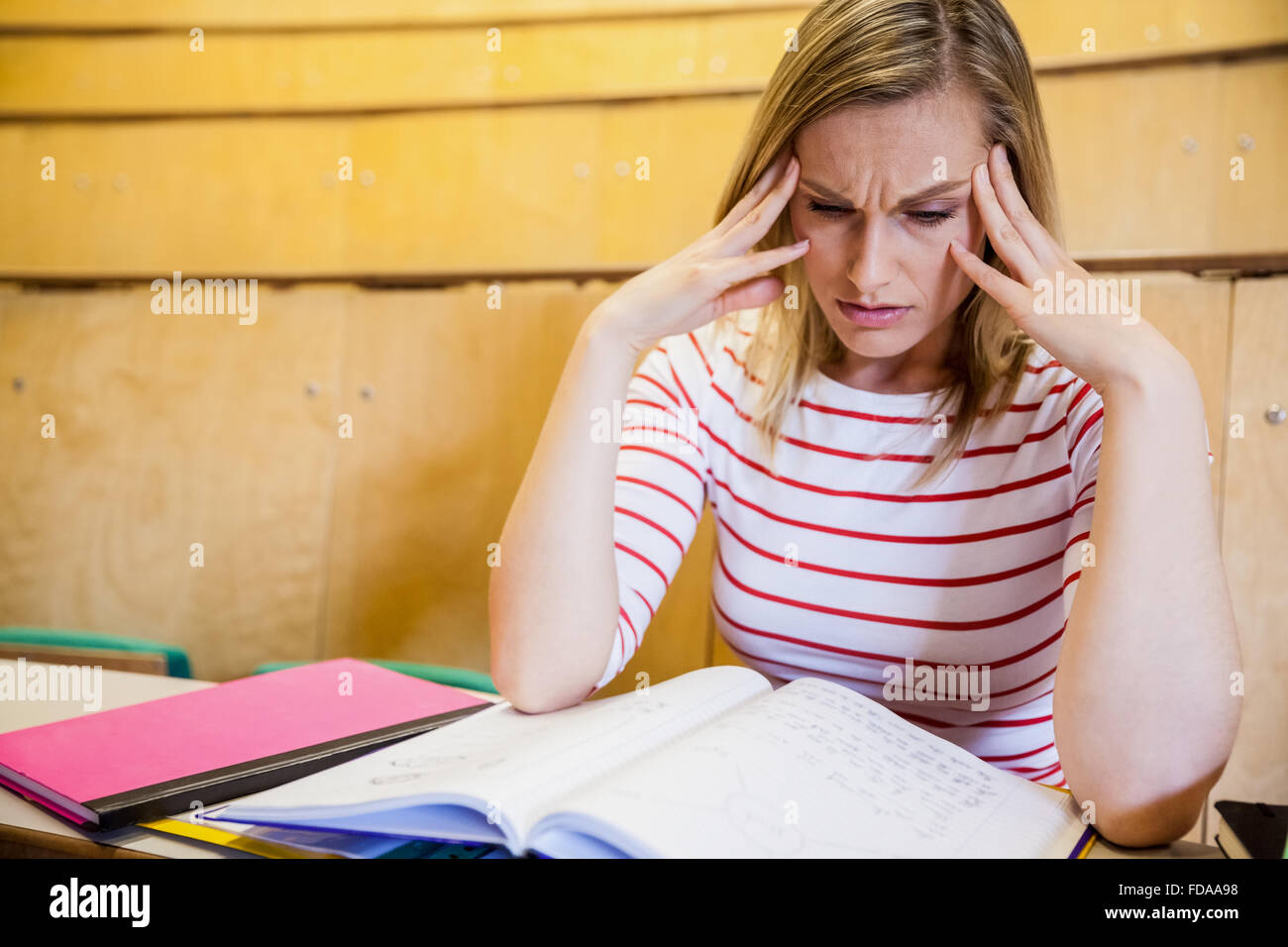 Busy female student studying Stock Photo - Alamy
