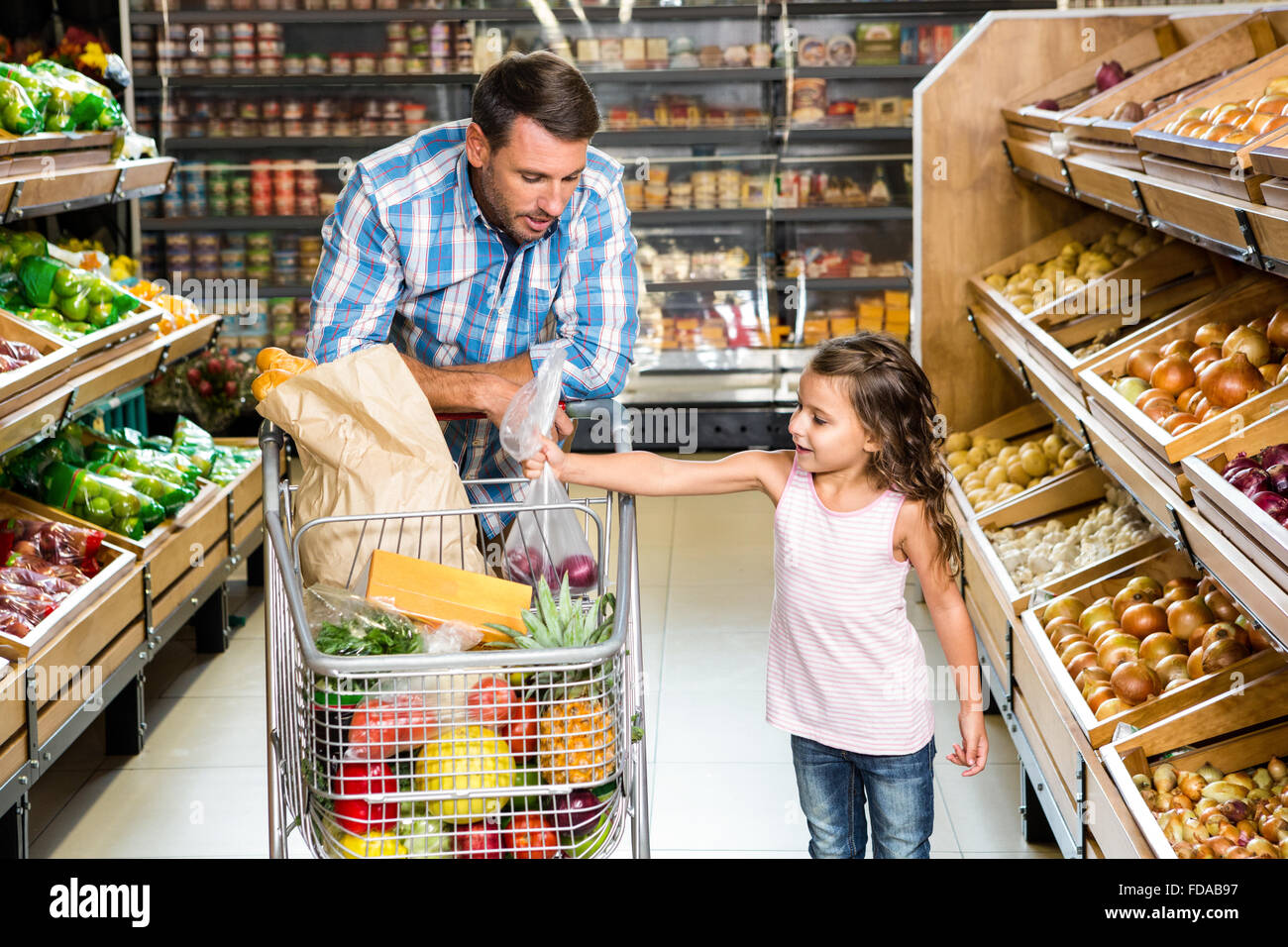 Father and daughter doing shopping Stock Photo - Alamy