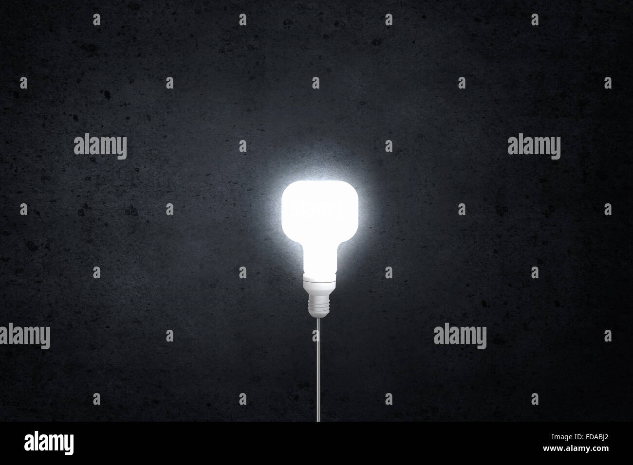 Glowing inverted light bulb on dark background Stock Photo - Alamy