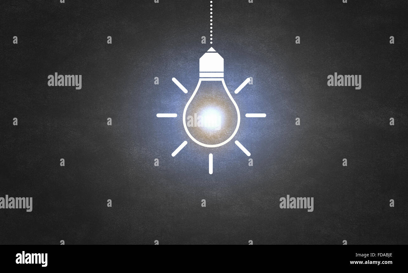 Glowing light bulb on dark background hanging from above Stock Photo ...