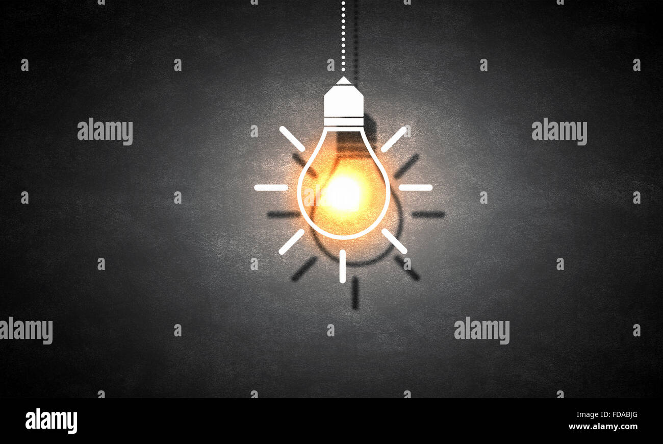 Glowing light bulb on dark background hanging from above Stock Photo ...