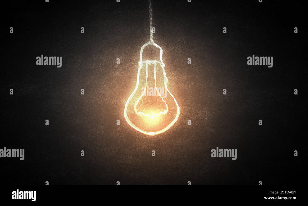 Glowing light bulb on dark background hanging from above Stock Photo ...