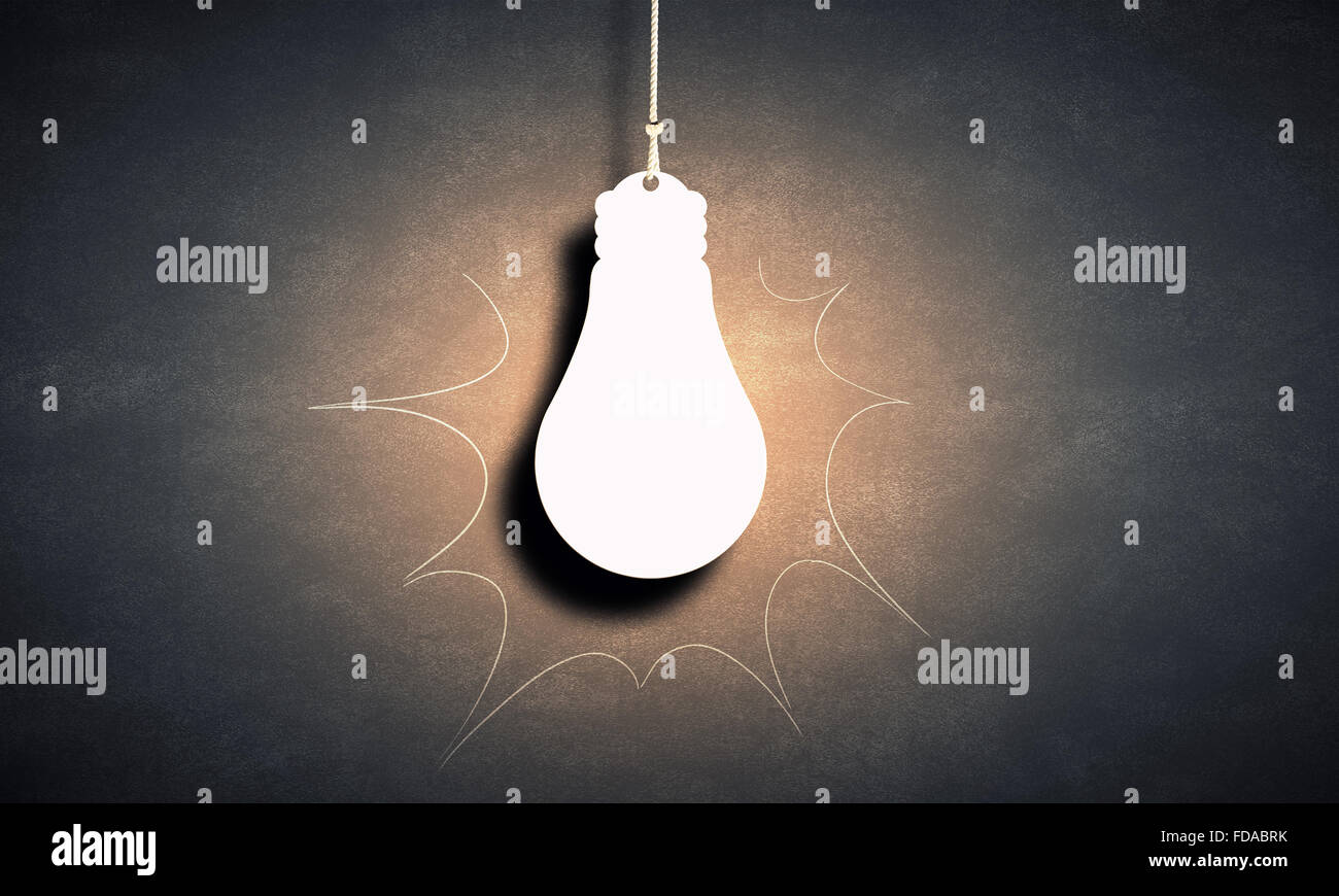 Glowing light bulb on dark background hanging from above Stock Photo ...