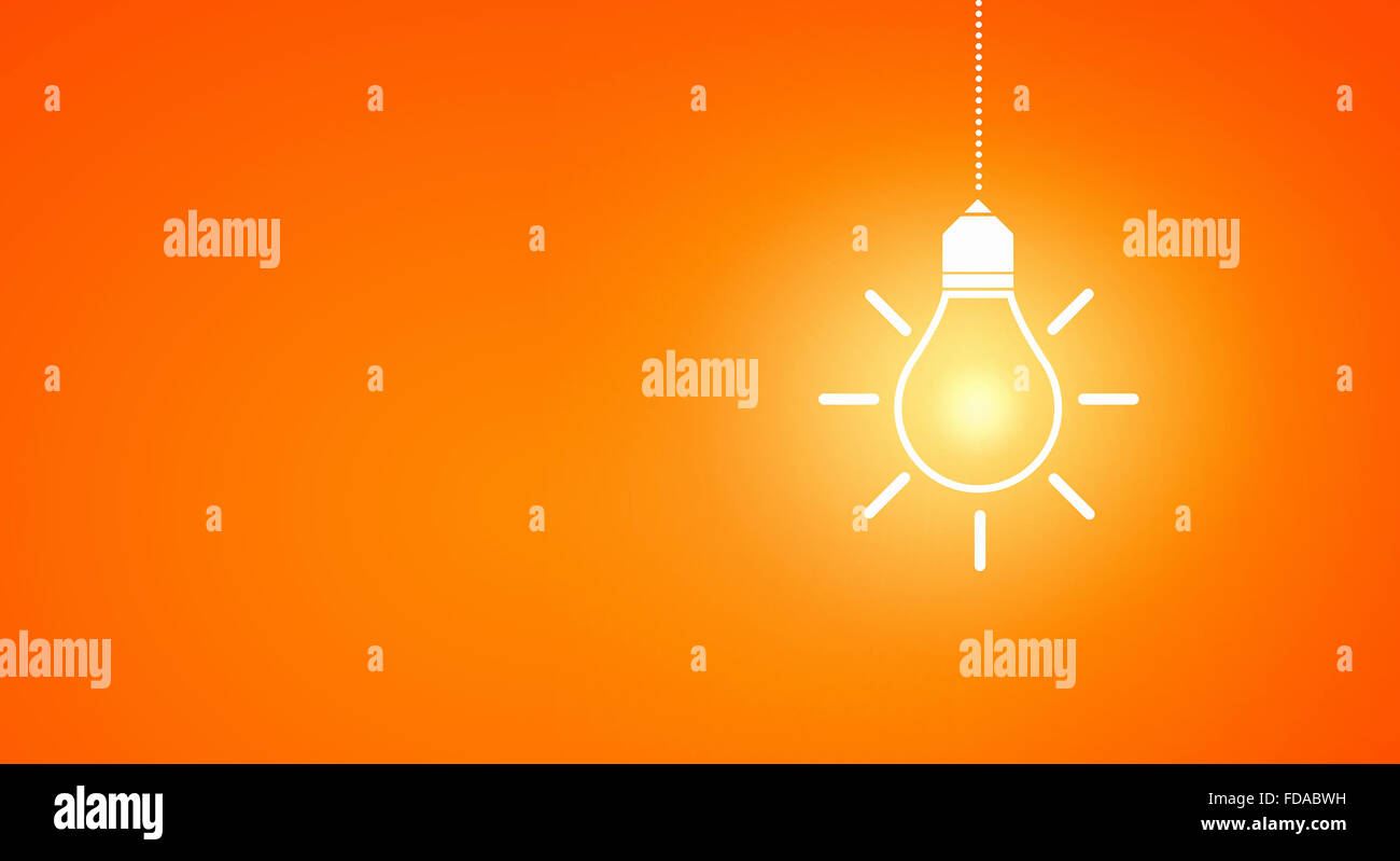 Glowing light bulb on dark background hanging from above Stock Photo ...