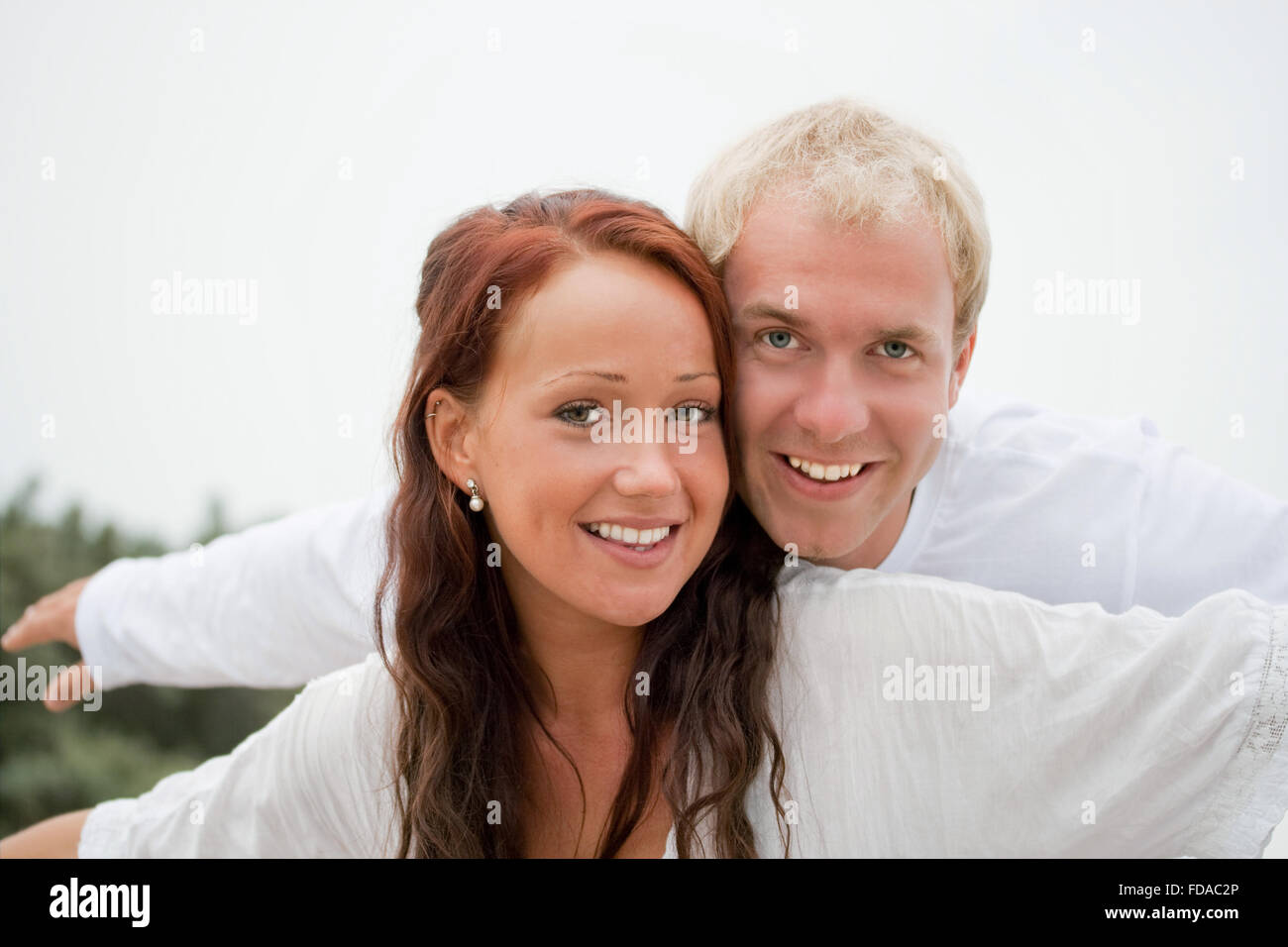 A young couple having lots of fun together Stock Photo - Alamy