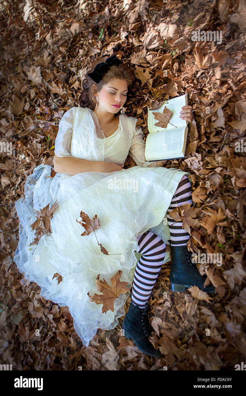 Woman character reading book hi-res stock photography and images - Alamy
