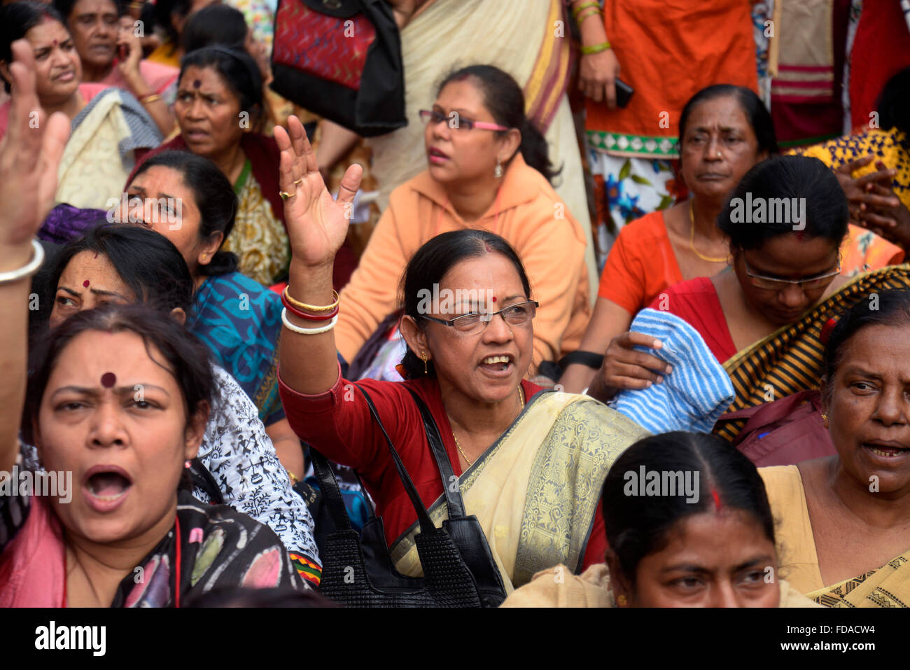 Kolkata, India. 29th Jan, 2016. Women shouting while raising their hand ...