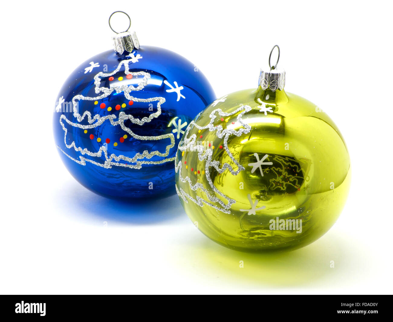 Two isolated tree balls in blue and yellow Stock Photo - Alamy