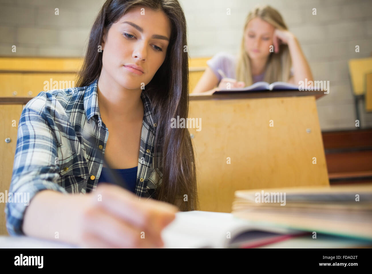 Serious students working in class Stock Photo - Alamy