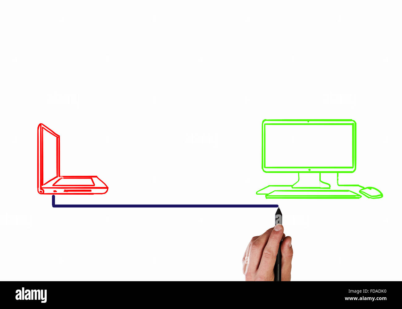 Close up of male hand drawing connection between laptop and computer ...