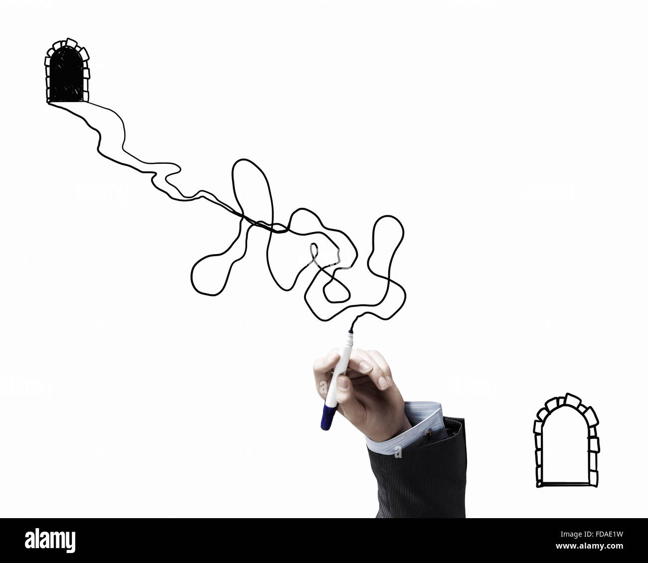 Close up of male hand drawing twisted way from one door to another ...