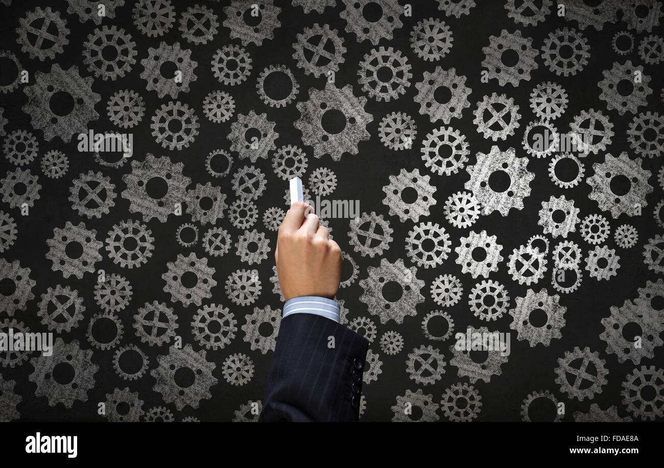 Close up of hand drawing gears mechanism with marker Stock Photo - Alamy
