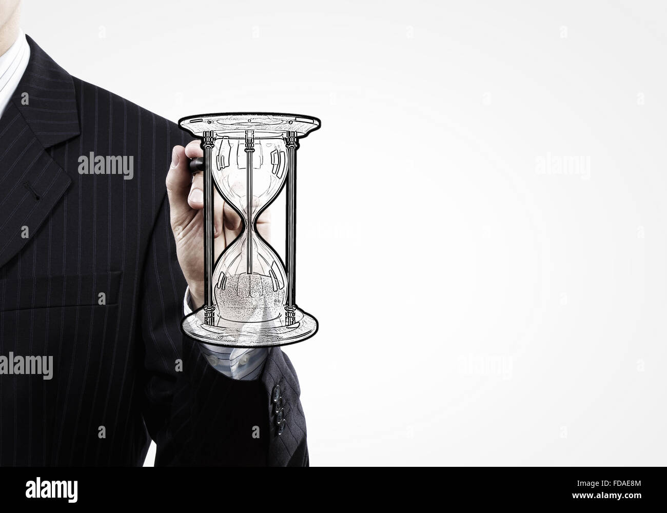 Close up of male hand drawing sandglass Stock Photo - Alamy