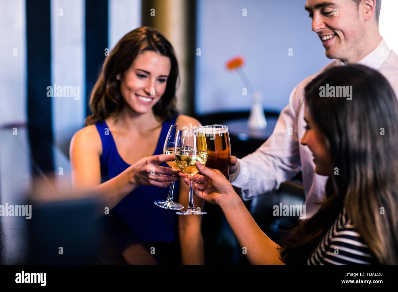 Friends toasting together Stock Photo - Alamy