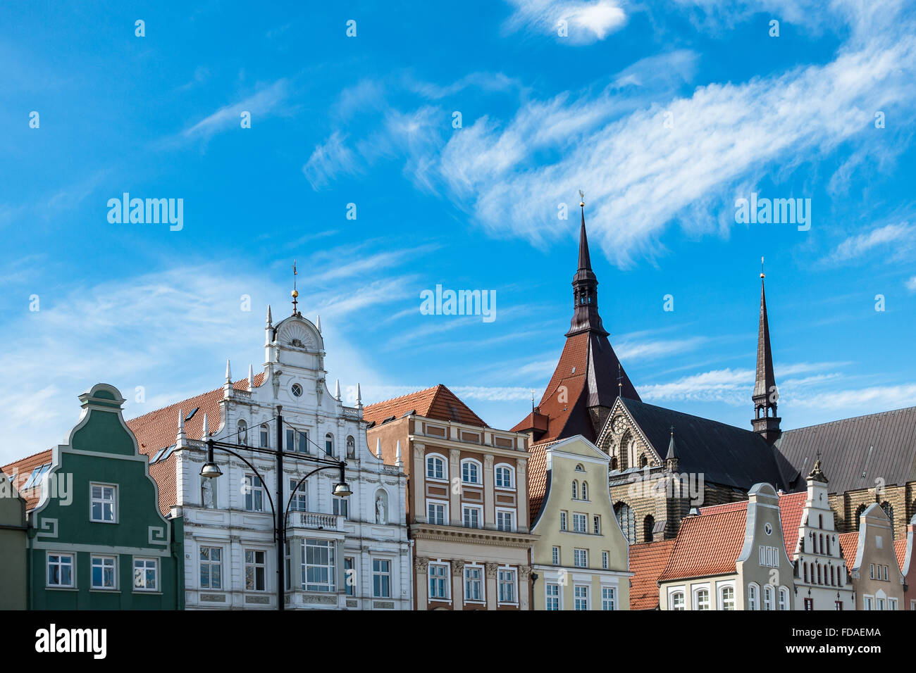 Historical buildings in Rostock (Germany) with blue sky Stock Photo - Alamy