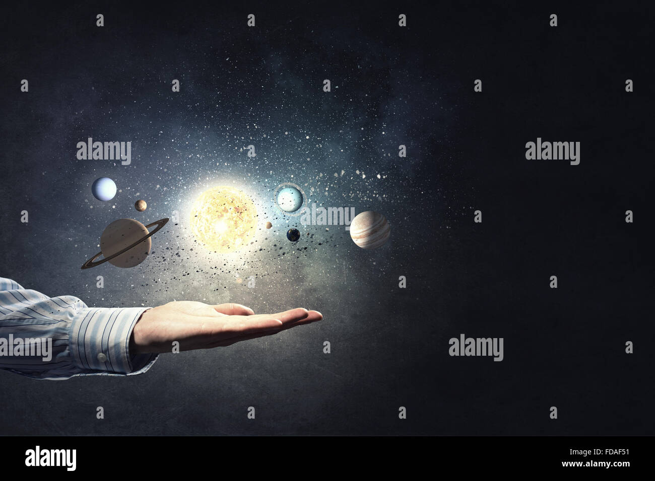 Close up of planet sun system in your hand Stock Photo - Alamy