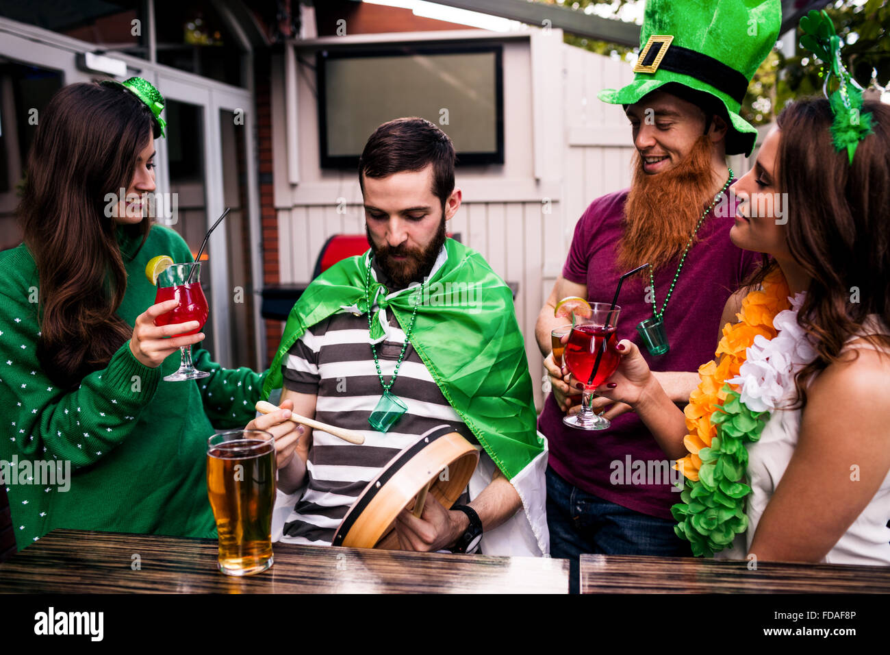 Friends celebrating St Patricks day Stock Photo - Alamy