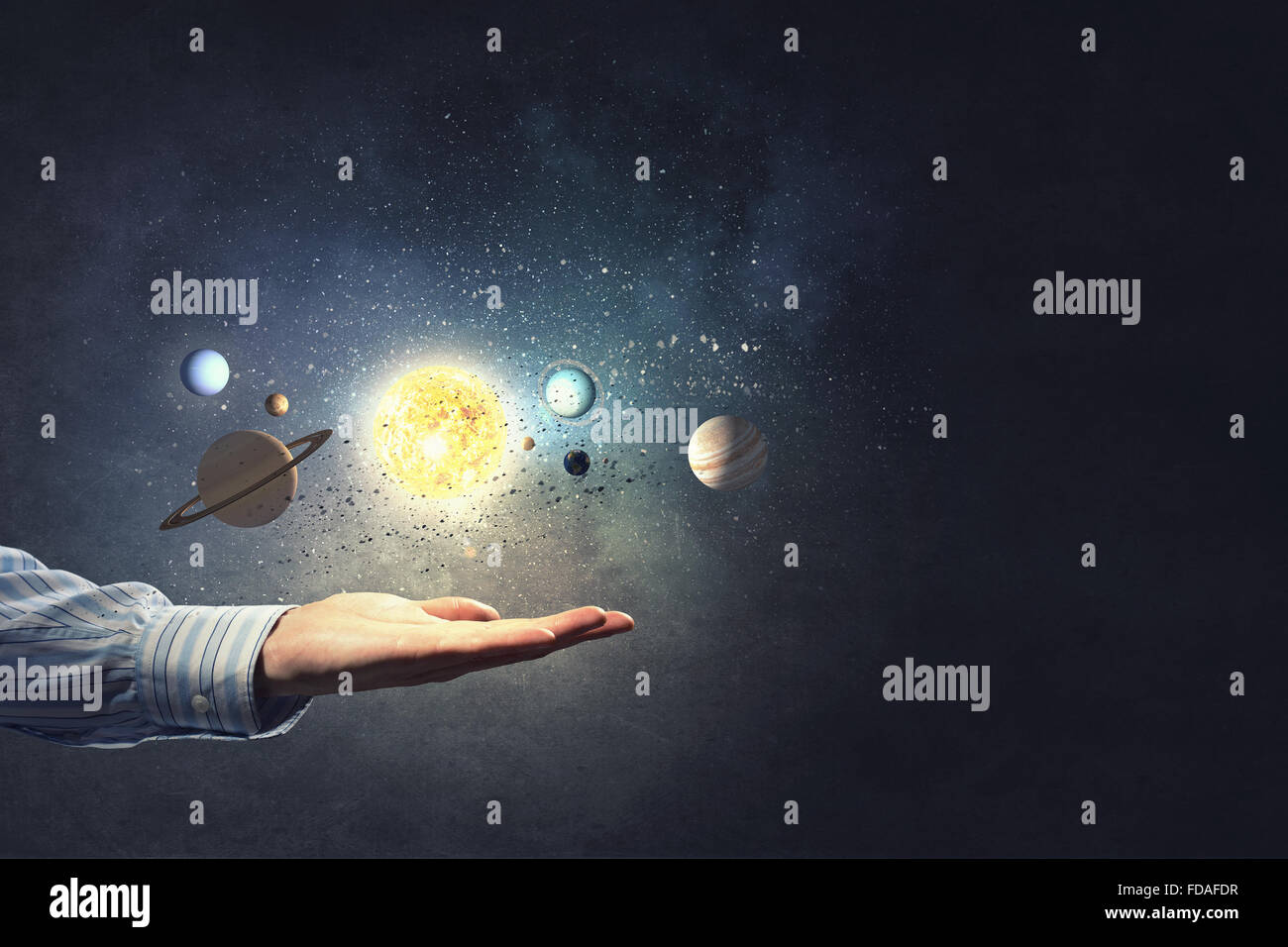 Close up of planet sun system in your hand Stock Photo - Alamy