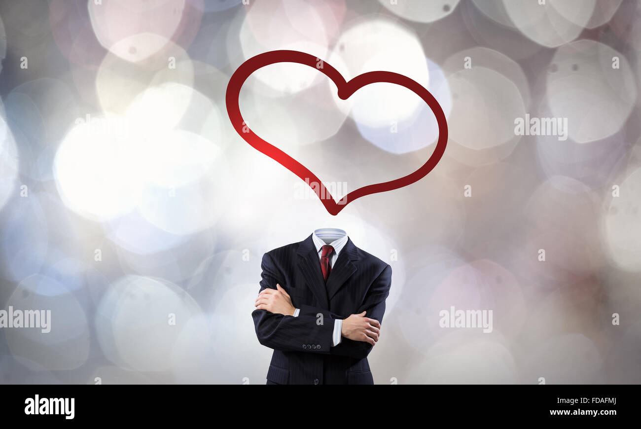 Faceless businessman with heart instead of head Stock Photo - Alamy