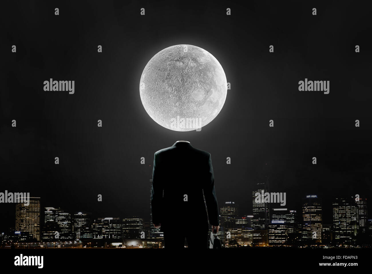 Faceless businessman with moon planet instead of head Stock Photo - Alamy