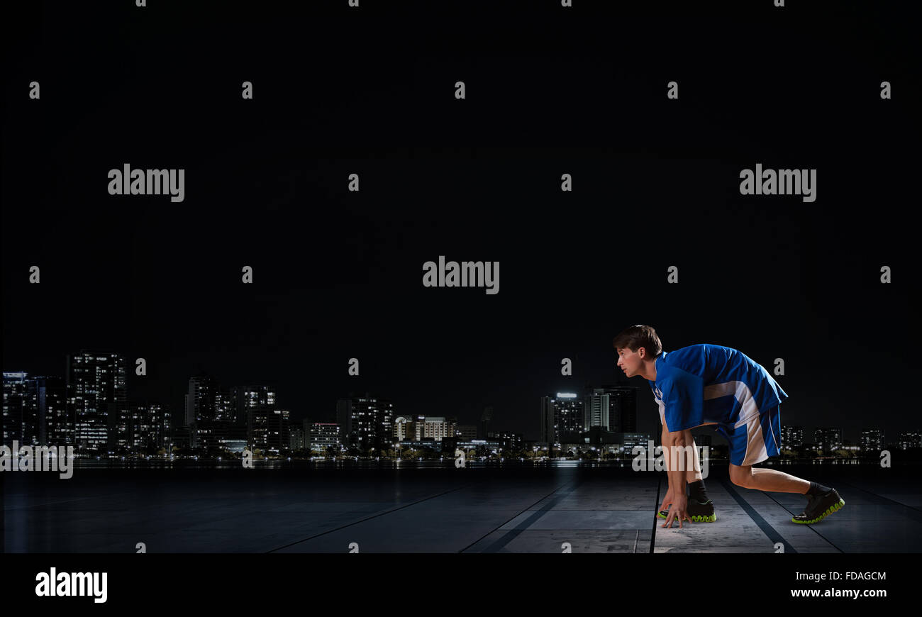 Athlete man in start pose hi-res stock photography and images - Alamy