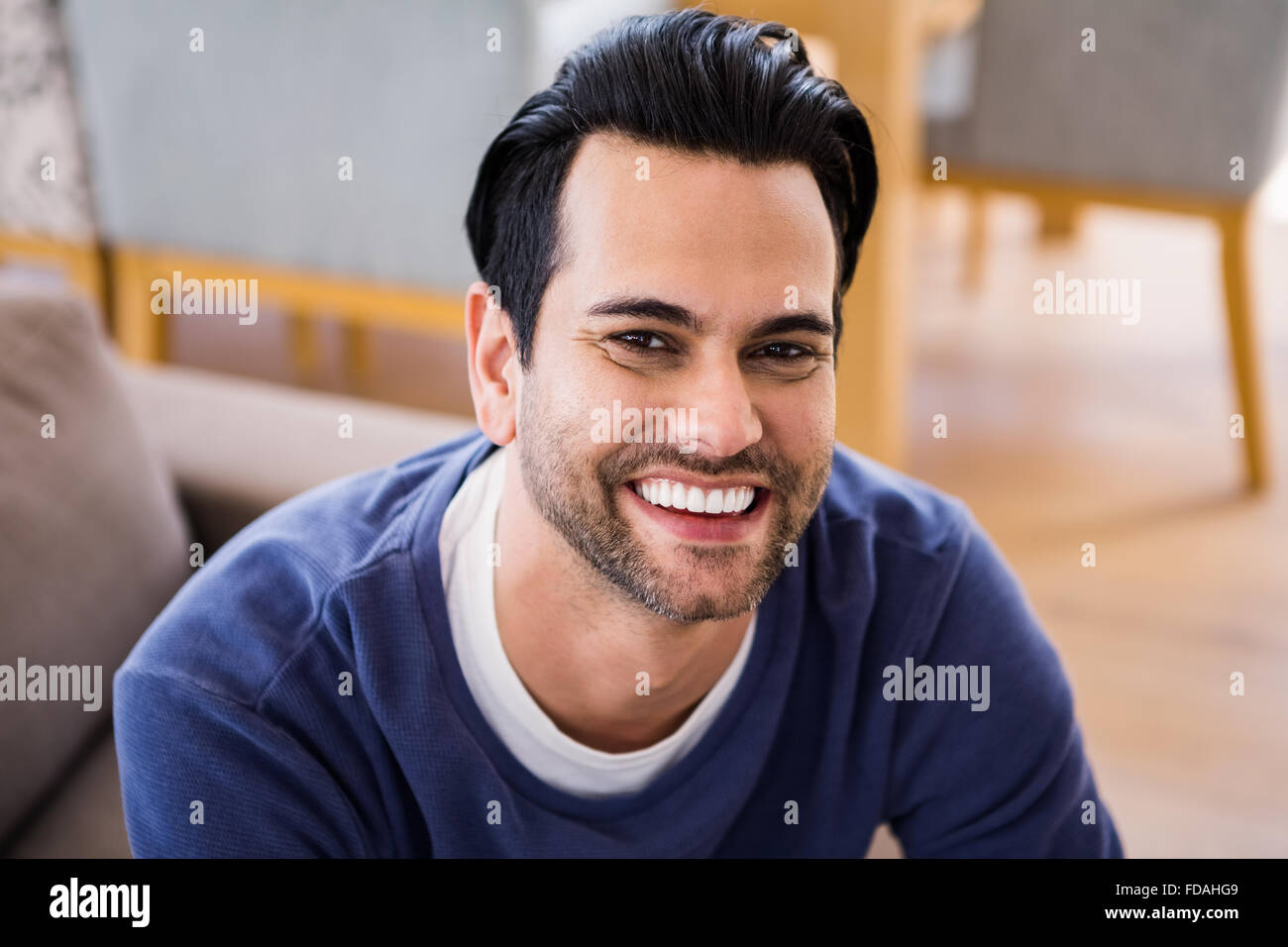 Handsome man looking at camera Stock Photo - Alamy