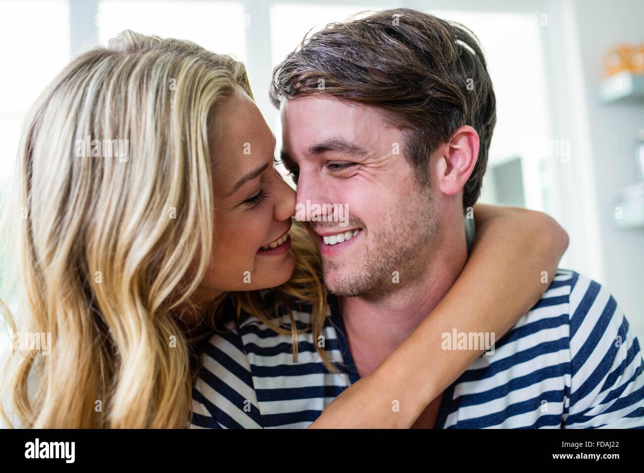 Cute couple hugging Stock Photo - Alamy