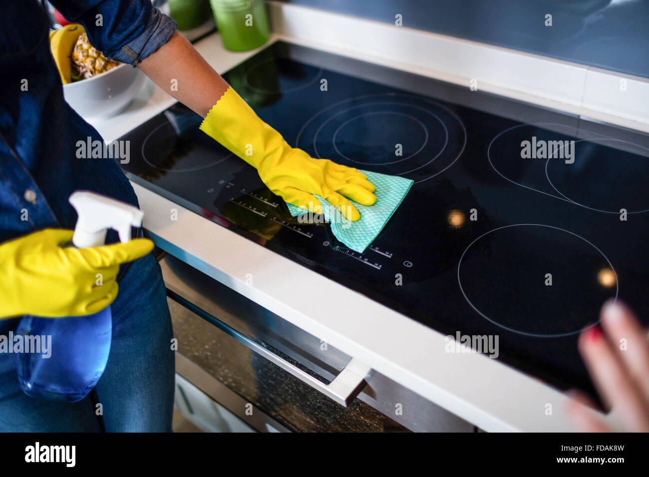 Woman cleaning up Stock Photo - Alamy