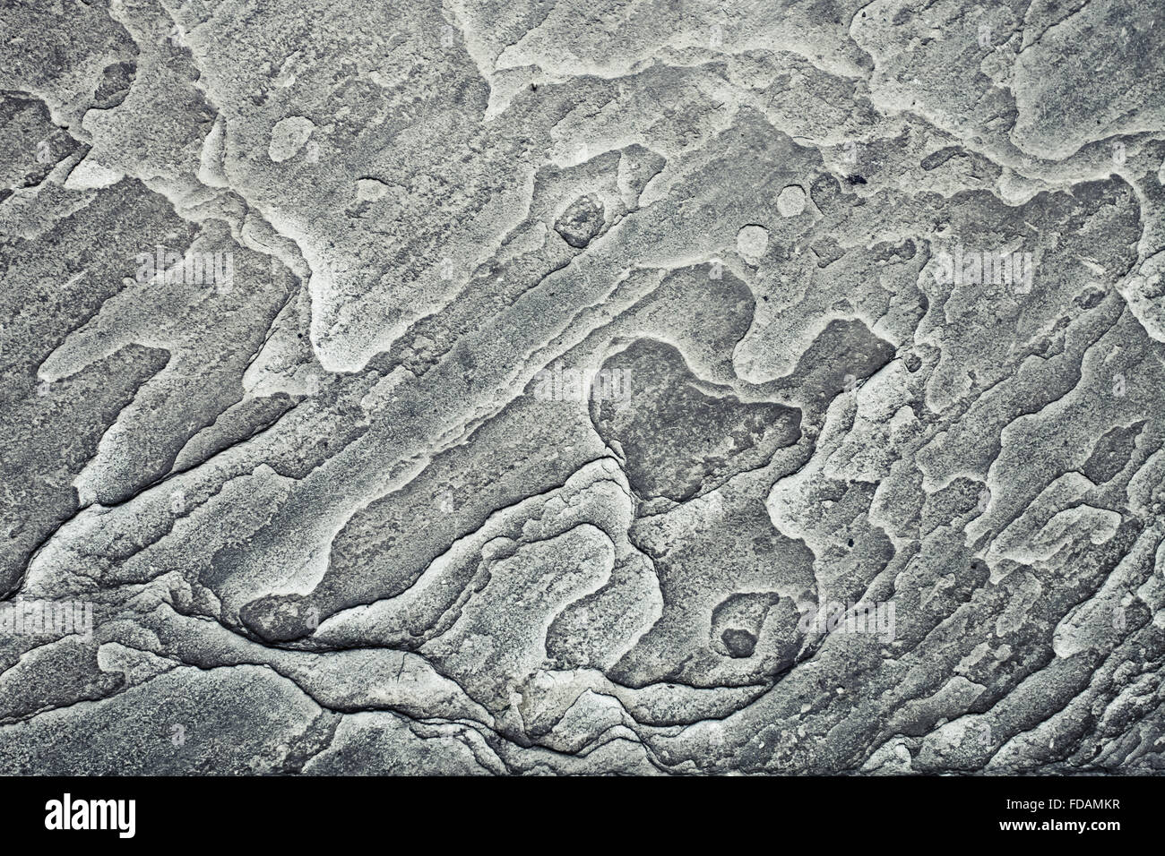 A detailed patten on a stone surface as a background image Stock Photo ...