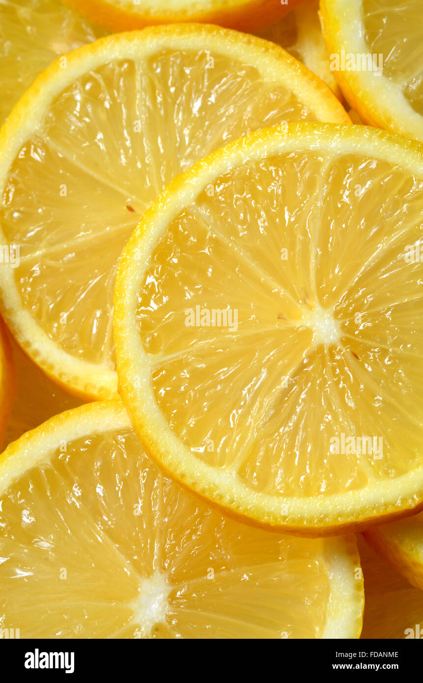 Close up image of bright yellow lemons Stock Photo - Alamy