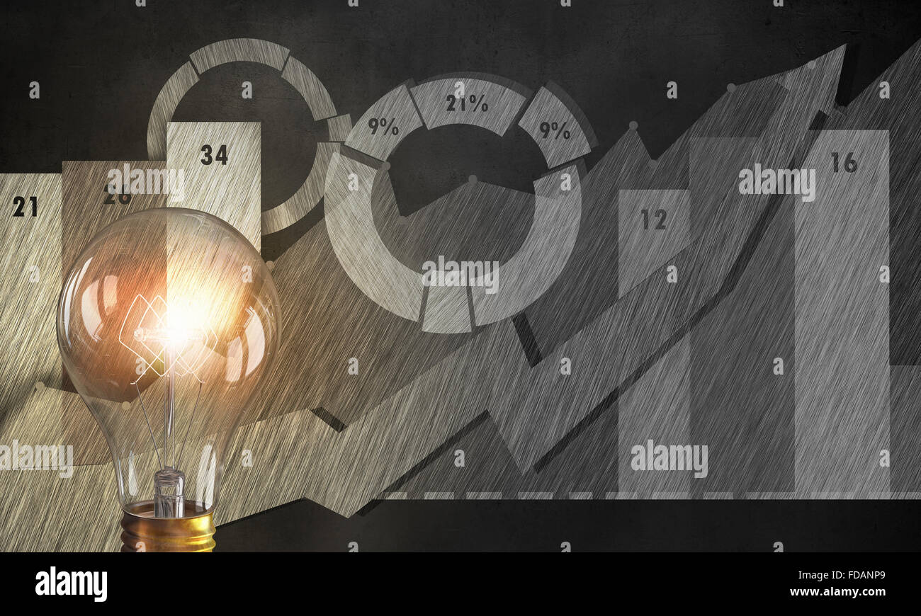 Glowing light bulb on background of diagrams and graphs Stock Photo - Alamy