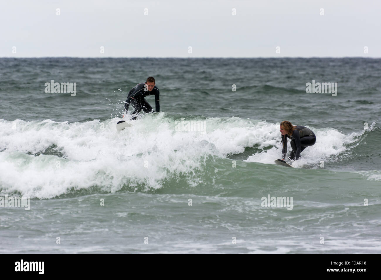Surfing in Cornwall Stock Photo - Alamy