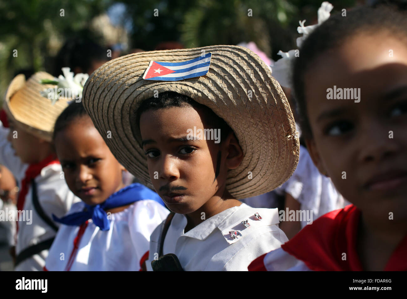Cuban children are concentrated in a park in Havana to pay homage to ...