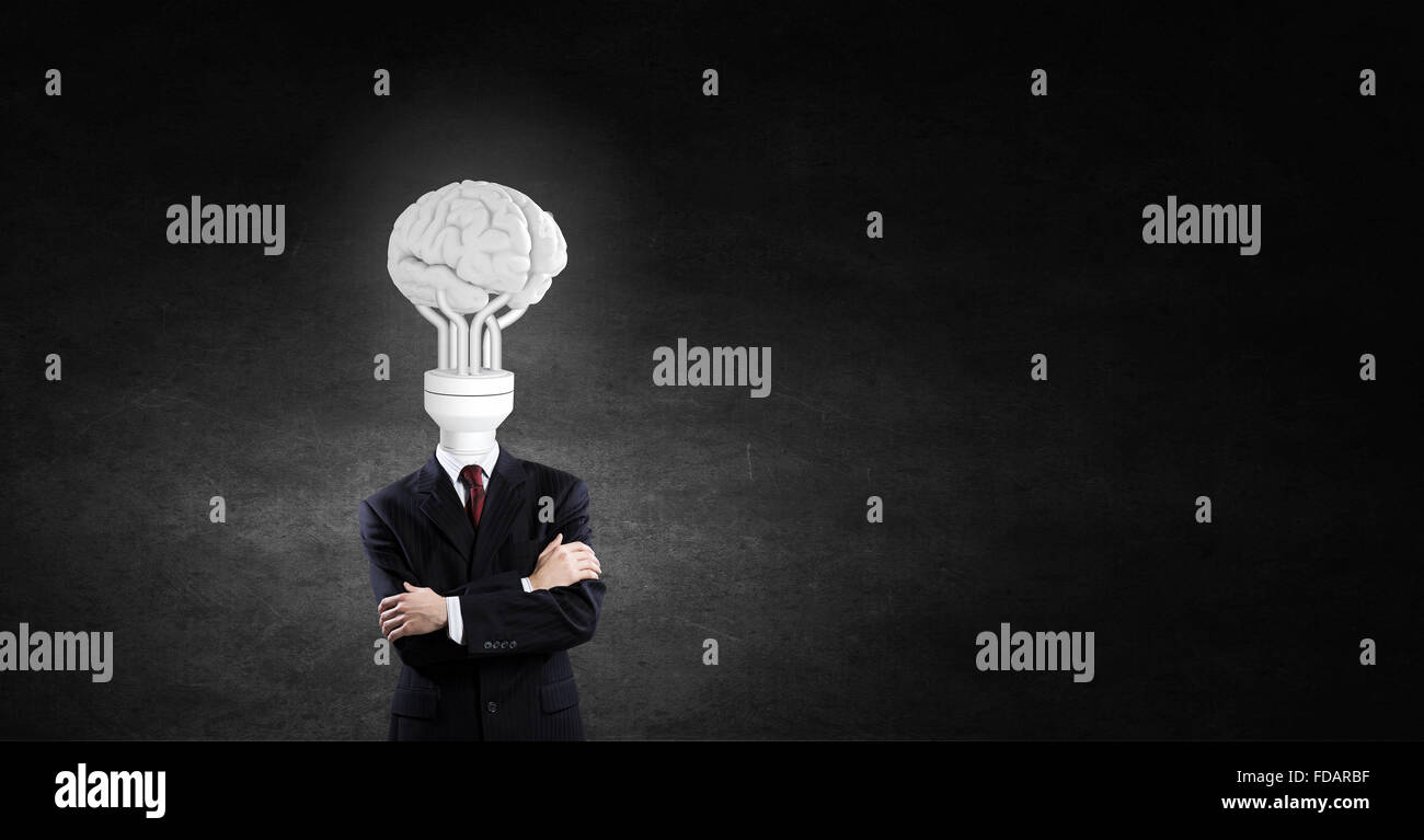 Businessman in suit with light bulb instead of head Stock Photo - Alamy
