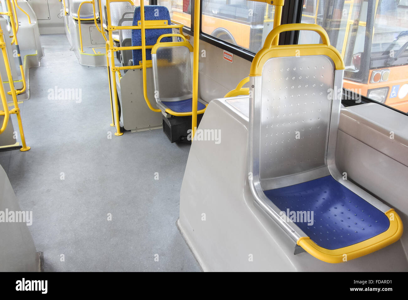 empty seat inside a city bus Stock Photo - Alamy