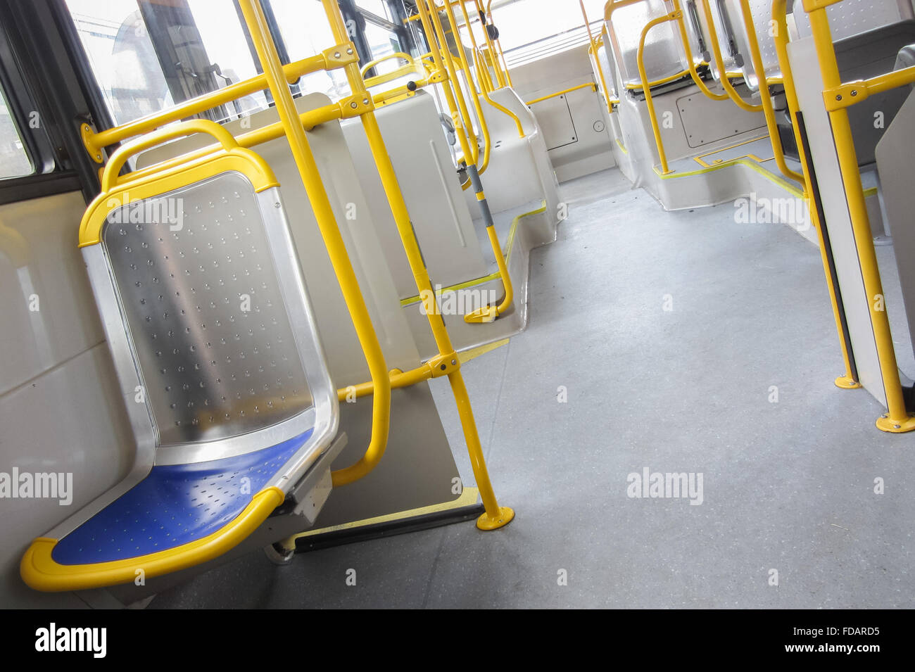 empty seat inside a city bus Stock Photo - Alamy