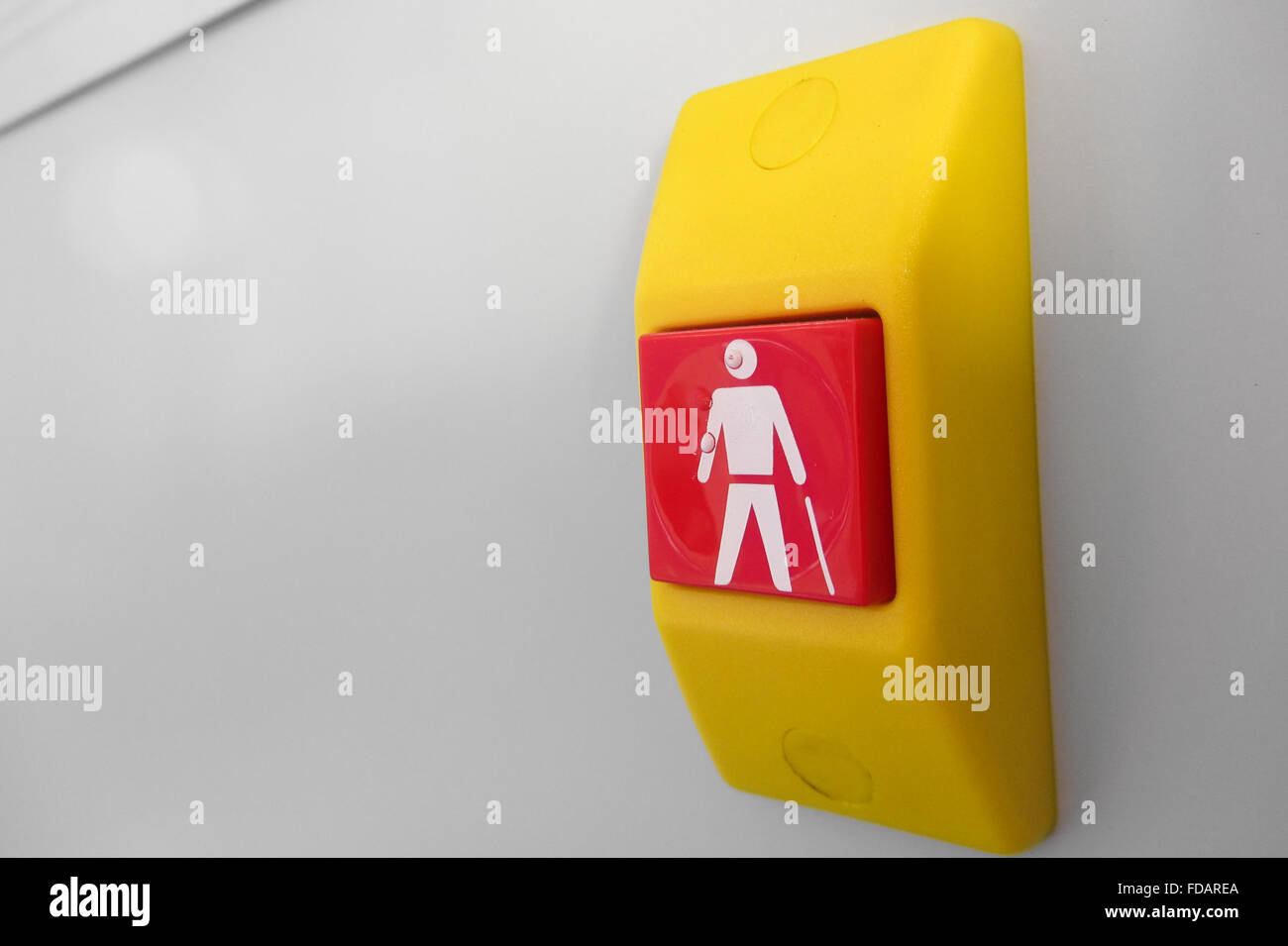 Stop on request button on bus Stock Photo - Alamy